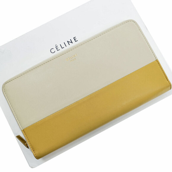 Celine | Bags | Celine Long Wallet Ivory White Yellow Leather Zipper ...